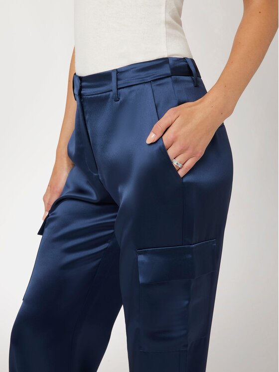 Guess Spodnie materiałowe 162395 Niebieski Slim Fit | Modivo.pl