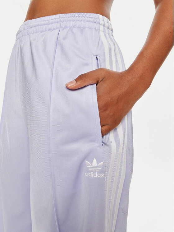 adidas Spodnie dresowe Firebird IP0643 Fioletowy Regular Fit | Modivo.pl
