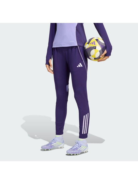 adidas Spodnie materiałowe 142091 Fioletowy Slim Fit | Modivo.pl