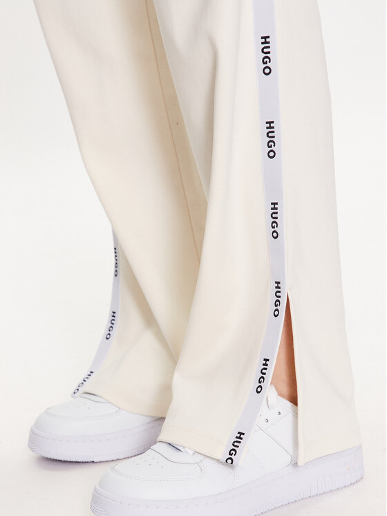 Hugo Spodnie dresowe Nelega 50487435 Écru Regular Fit | Modivo.pl