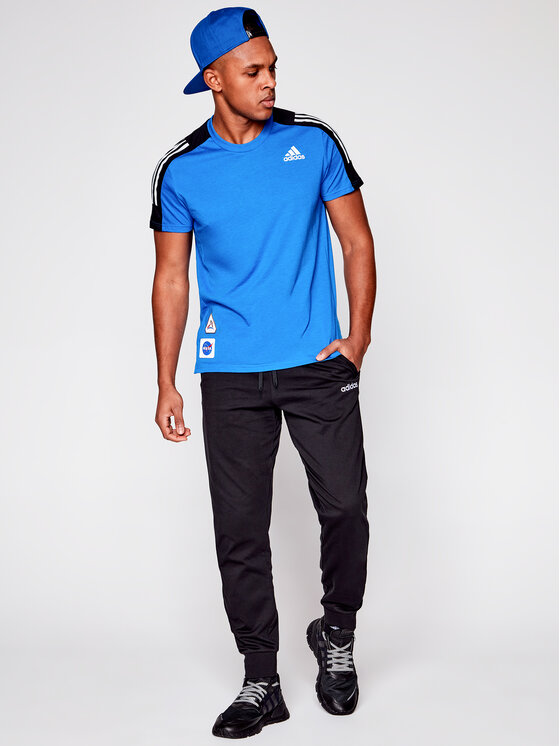 adidas Spodnie dresowe Essential FM4346 Czarny Regular Fit | Modivo.pl