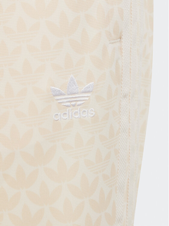 adidas Долнище анцуг Monogram Print Tracksuit Bottoms H62940 Бял ...