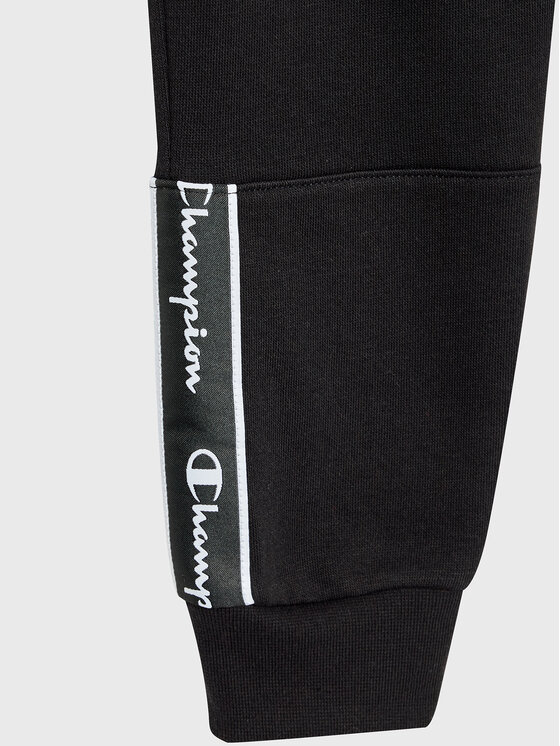 Champion Jogginganzug 306181 Schwarz Regular Fit | Modivo.de