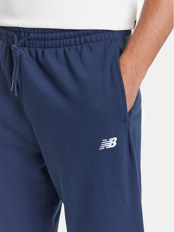 New Balance Spodnie dresowe Essentials MP41519 Granatowy Relaxed Fit ...