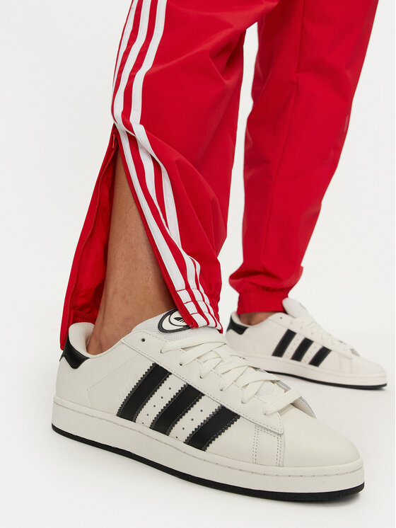 adidas Spodnie dresowe Adicolor Woven Firebird IT2498 Czerwony Regular ...