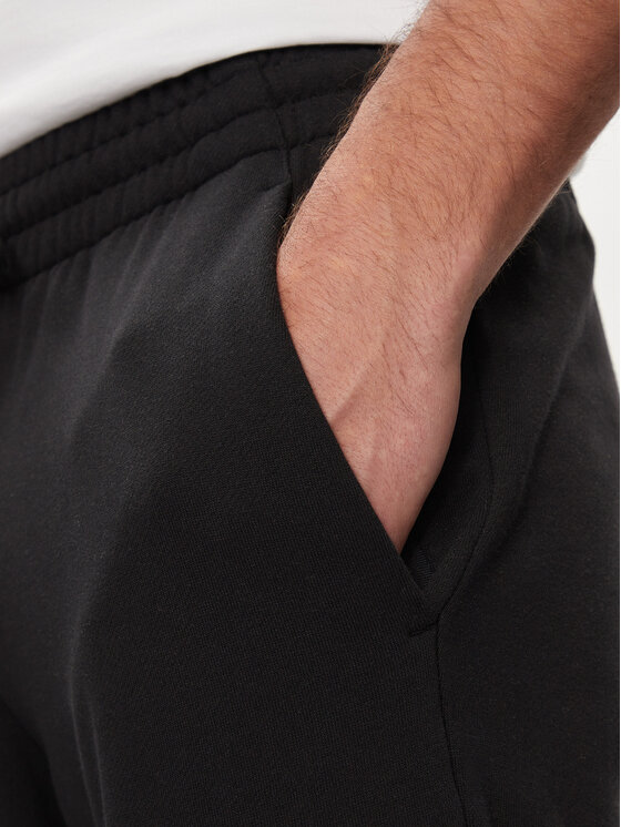 adidas Spodnie dresowe Essentials French Terry Tapered Cuff Logo ...