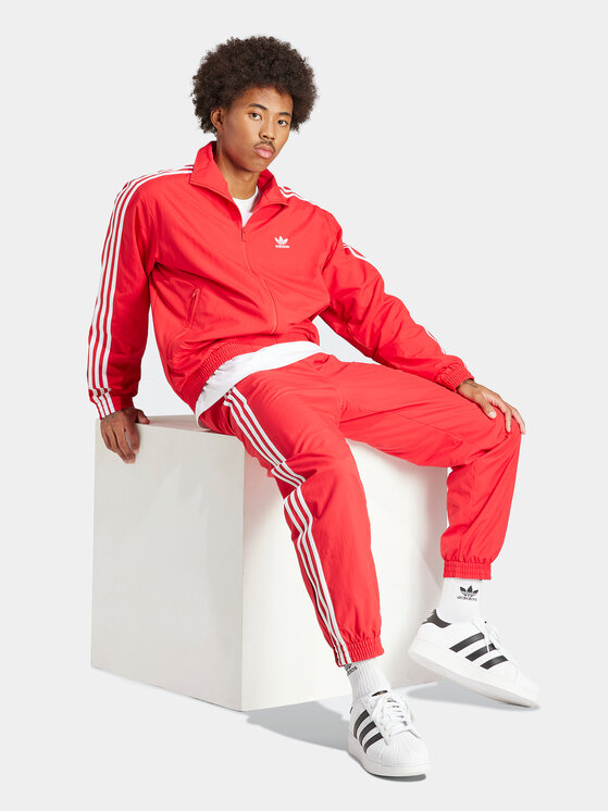 adidas Spodnie dresowe Adicolor Woven Firebird IT2498 Czerwony Regular ...