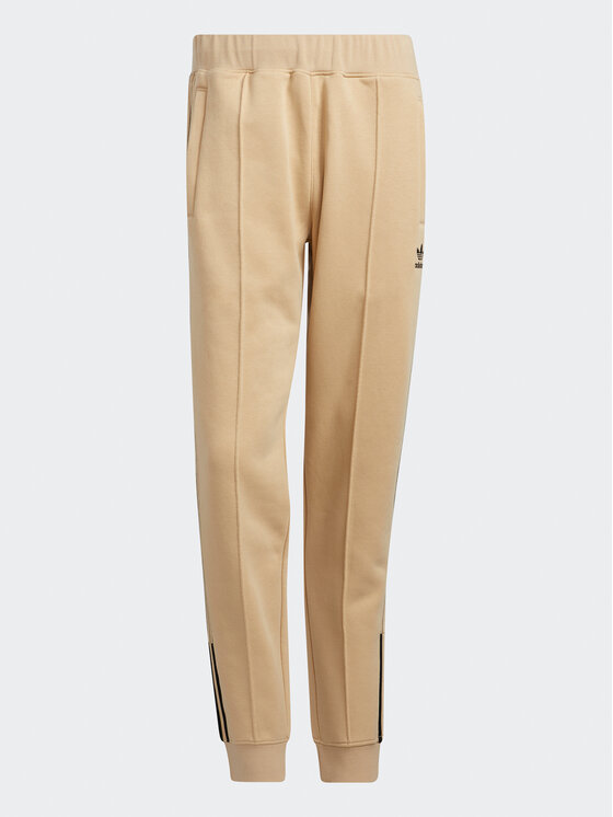 adidas Spodnie dresowe Fleece Sst HI2996 Beżowy Regular Fit | Modivo.pl