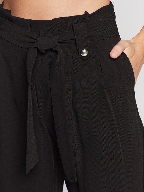 NAF NAF Kalhoty z materiálu Eboucle THNP60 Černá Relaxed Fit | Modivo.cz